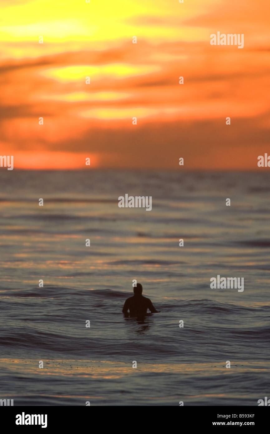 Surfer Watching the Sunset Sky Stock Photo - Alamy Surfer Watching the Sunset Sky Stock Photo - Alamy