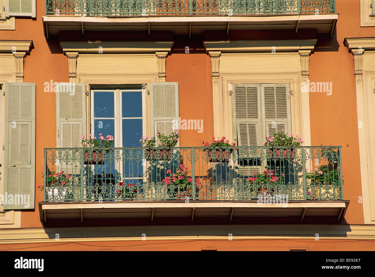 Detail of geraniums on a wrought iron balcony in the Old Town of Nice ...