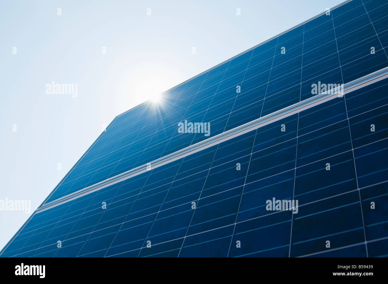 solar panel with sun hitting it Stock Photo - Alamy