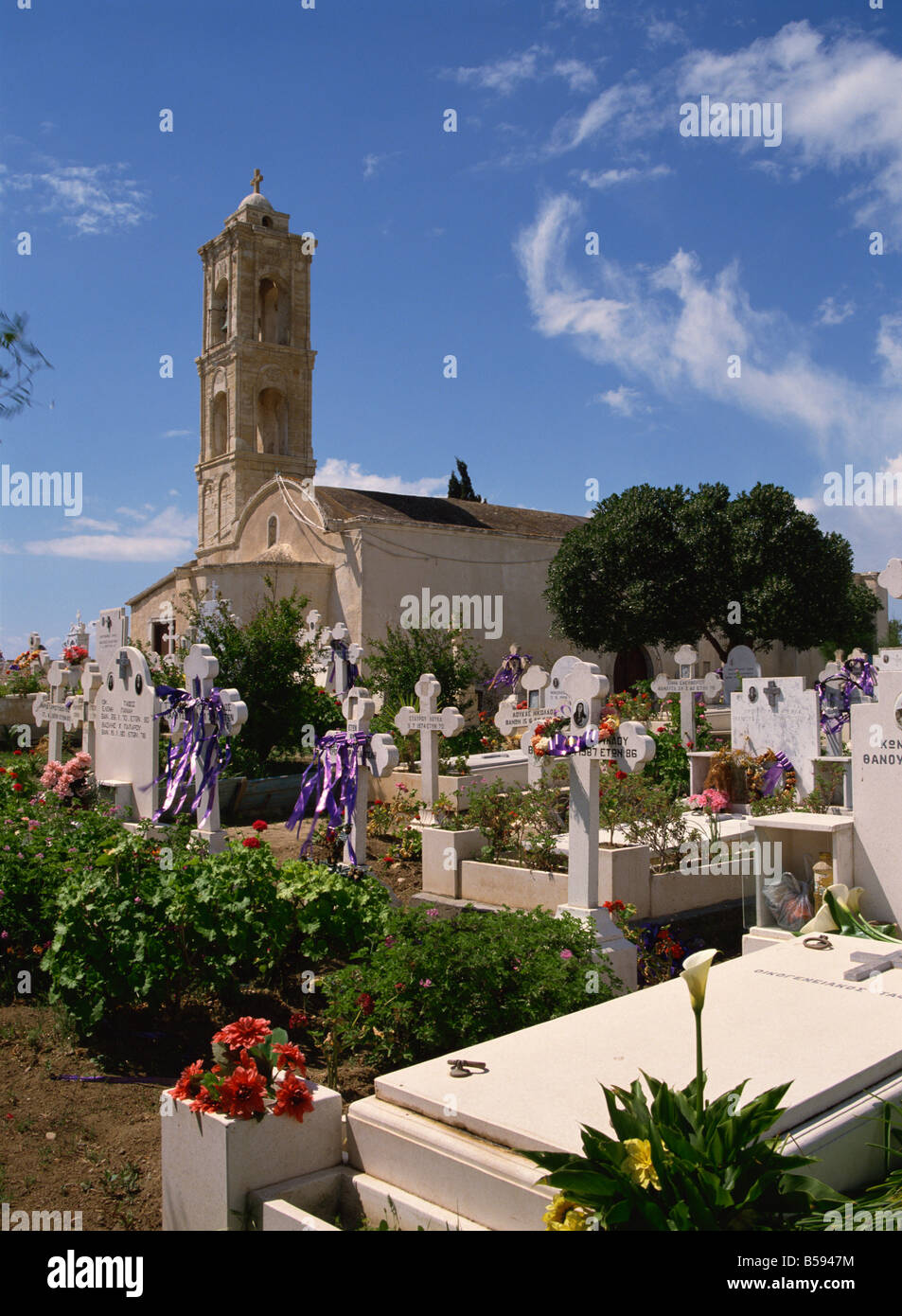 Graves decorated for Easter in front of church at Kiti, Cyprus, Europe ...