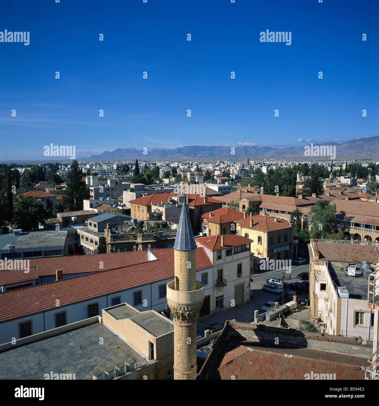 Minaret and skyline of Turkish Cypriot North Nicosia with Kyrenia ...