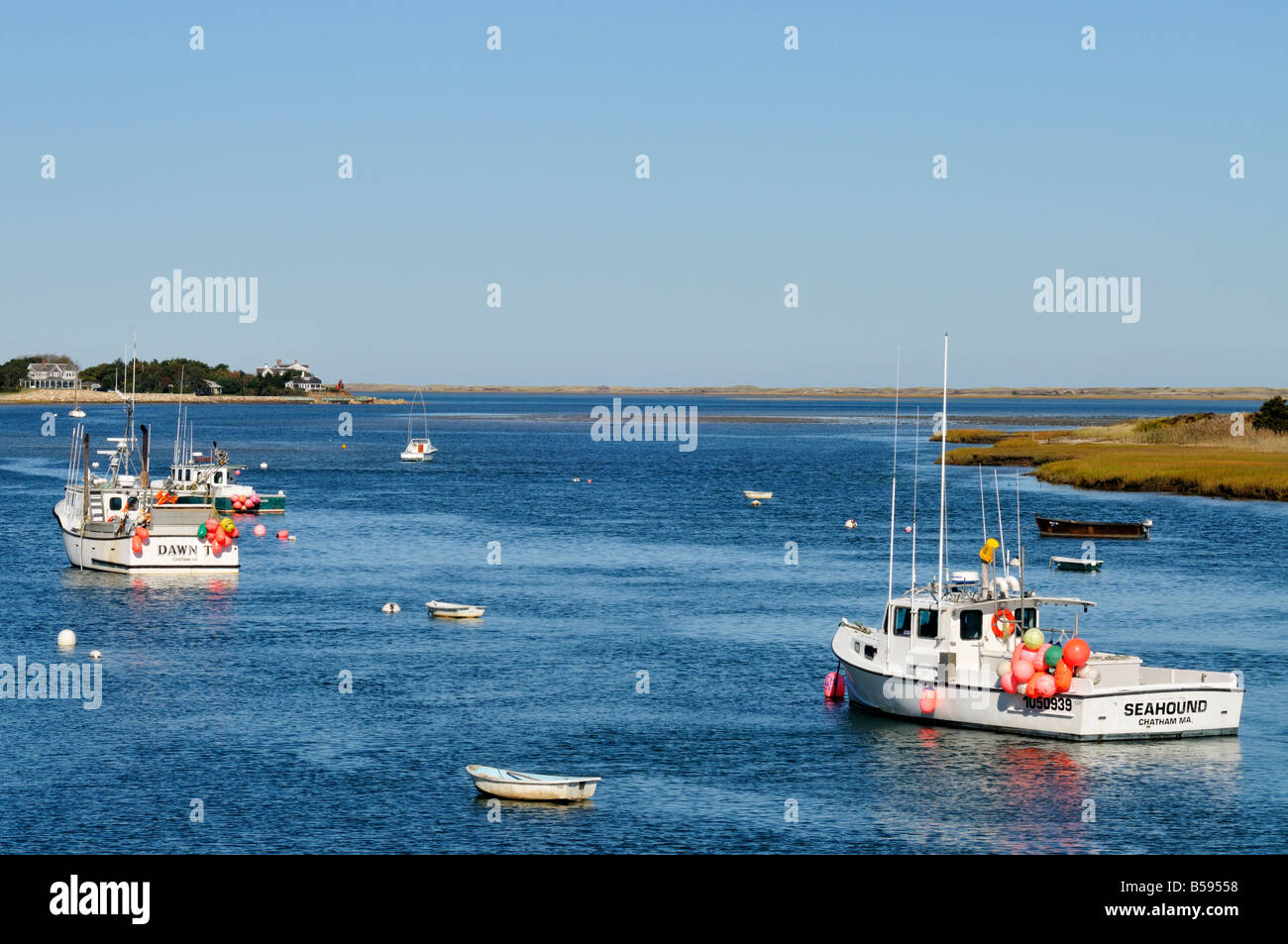 Two 2 Commercial fishing boats moored in Chatham Harbor, Cape Cod, MA ...