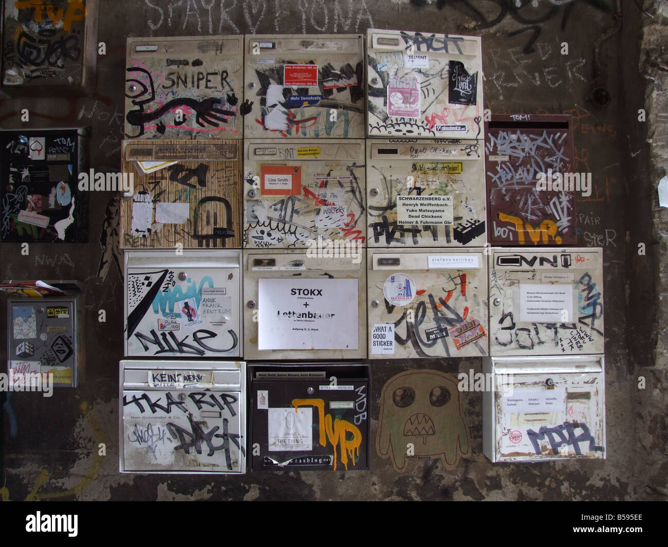 mail boxes covered with graffiti in berlin germany Stock Photo - Alamy