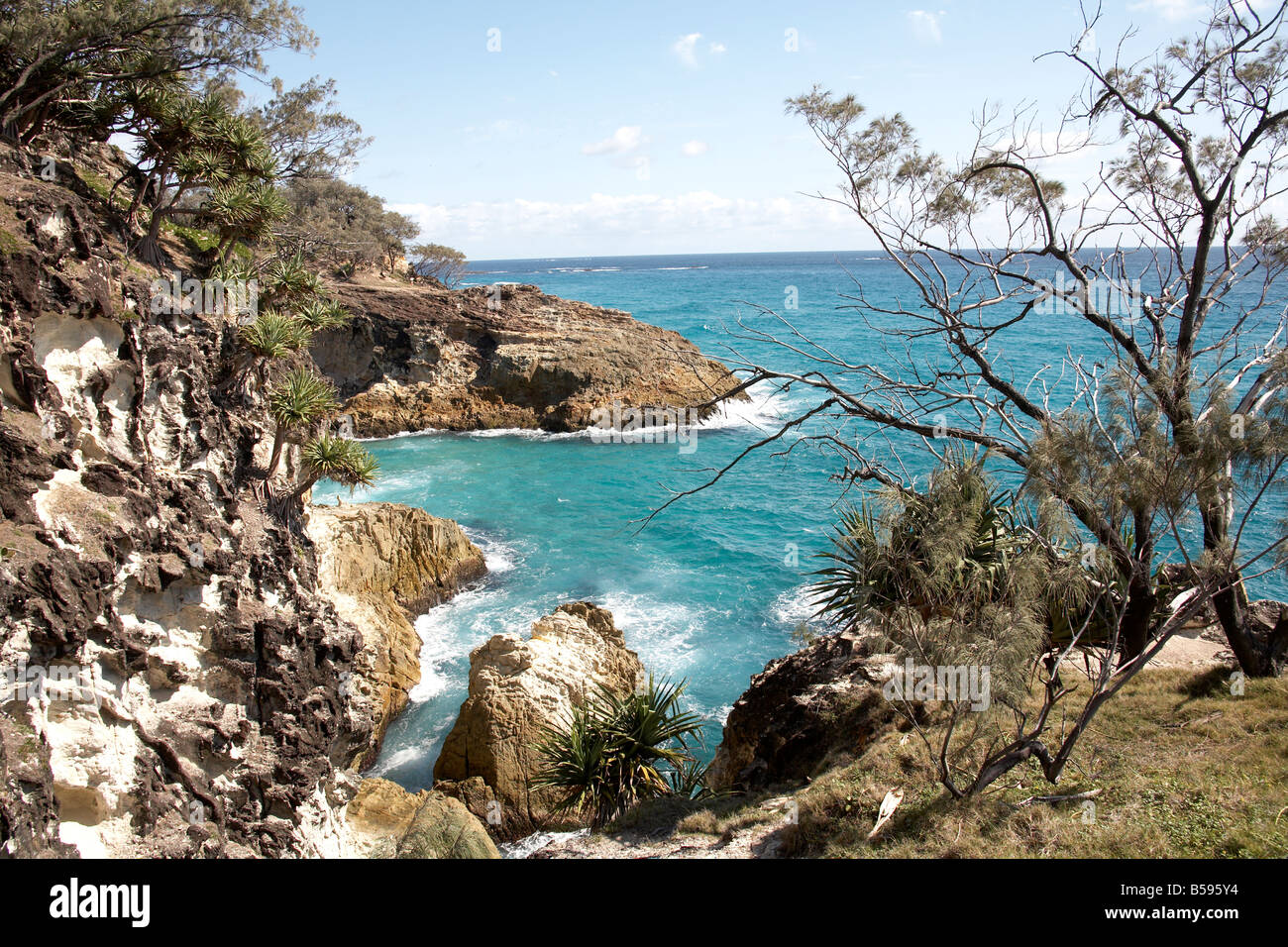 View of sea and rocky cliffs from Gorge Walk on North Stradbroke Island ...