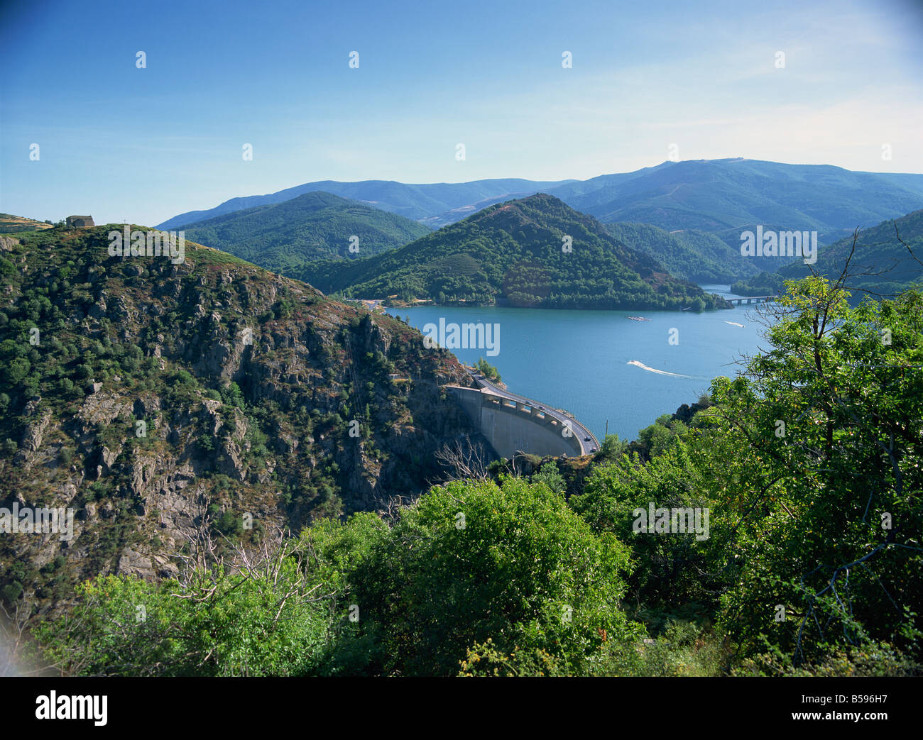 The Cevennes Dam with the Lac de Villefort and hills in the background ...