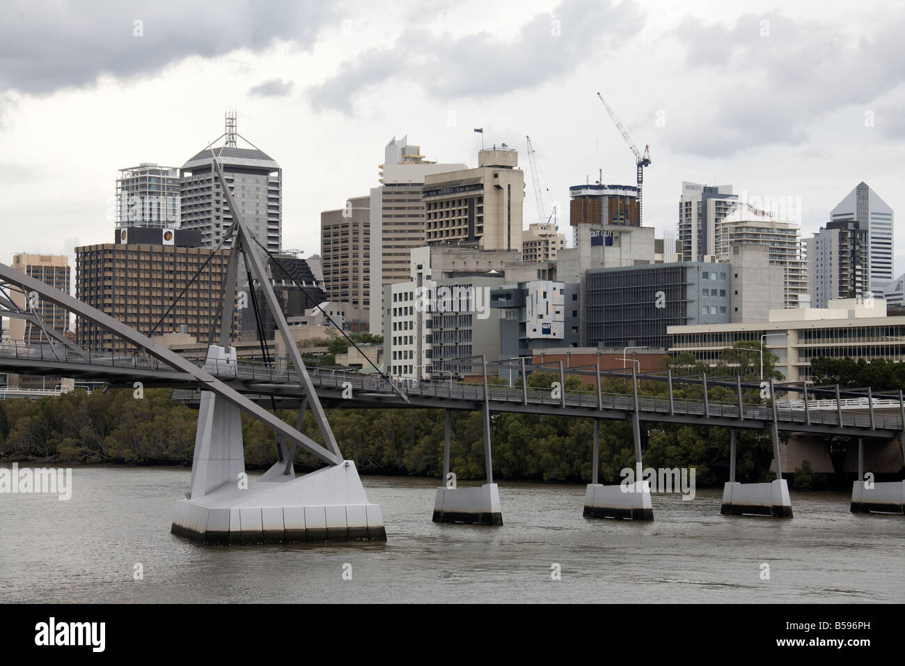 bridge river business district highrise buildings clouds in Brisbane ...