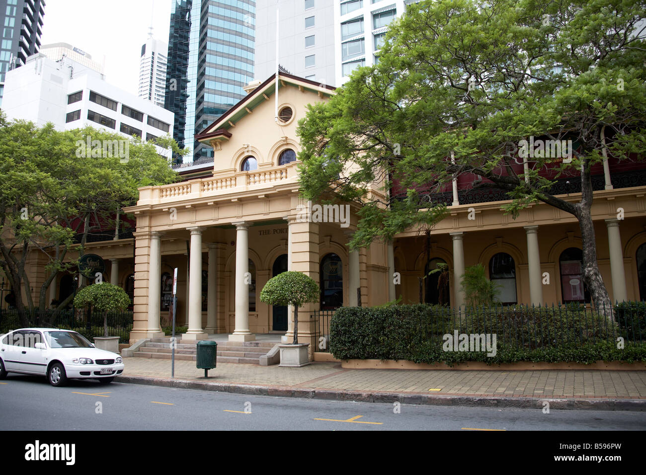 old victorian colonial house highrise city building cars in Brisbane ...