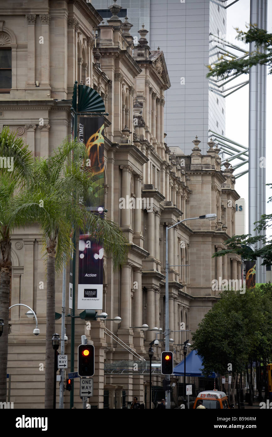 old victorian colonial building palms traffic lights highrise city ...