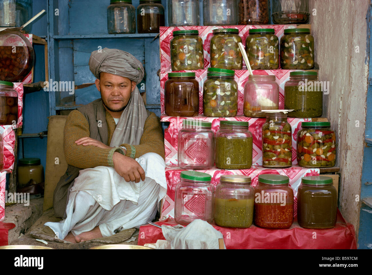 Portrait of a Pathan man at his stall selling pickles in Kabul ...