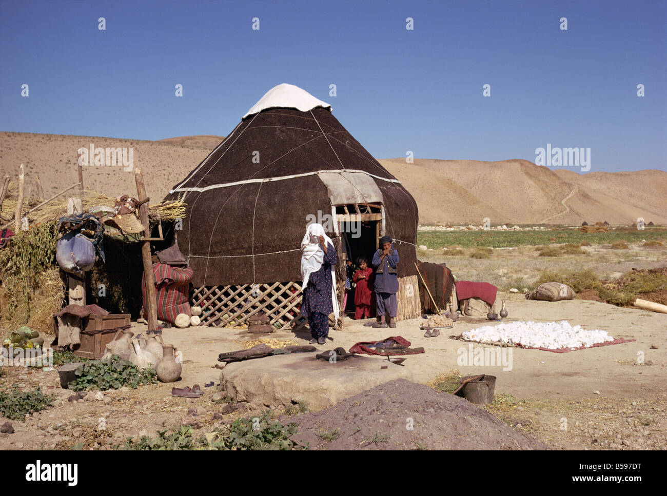 Uzbeki family outside yurt, near Maymana, Afghanistan Stock Photo - Alamy