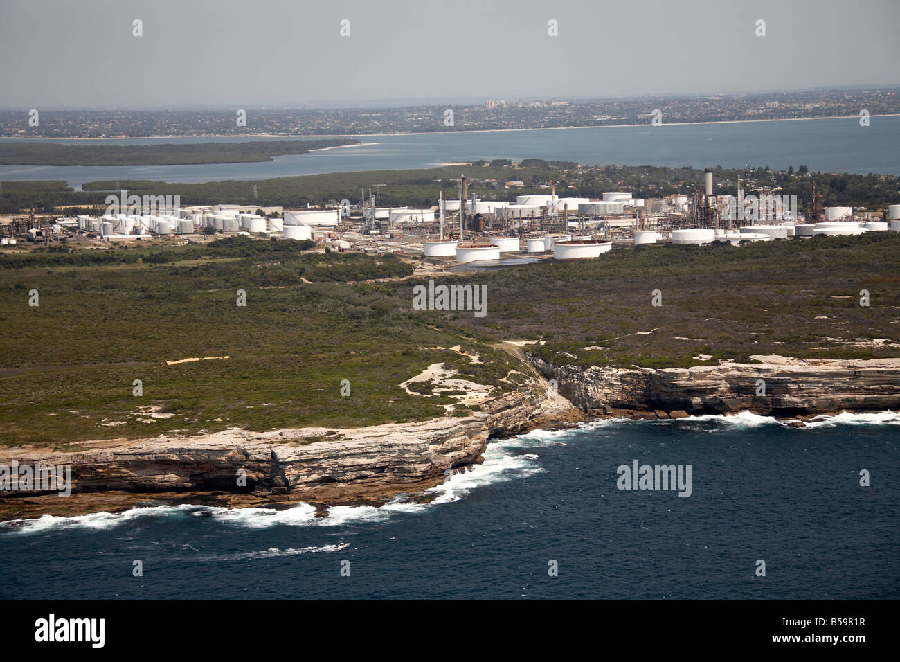 Aerial view west of oil refinery Botany Bay National park Sydney NSW ...