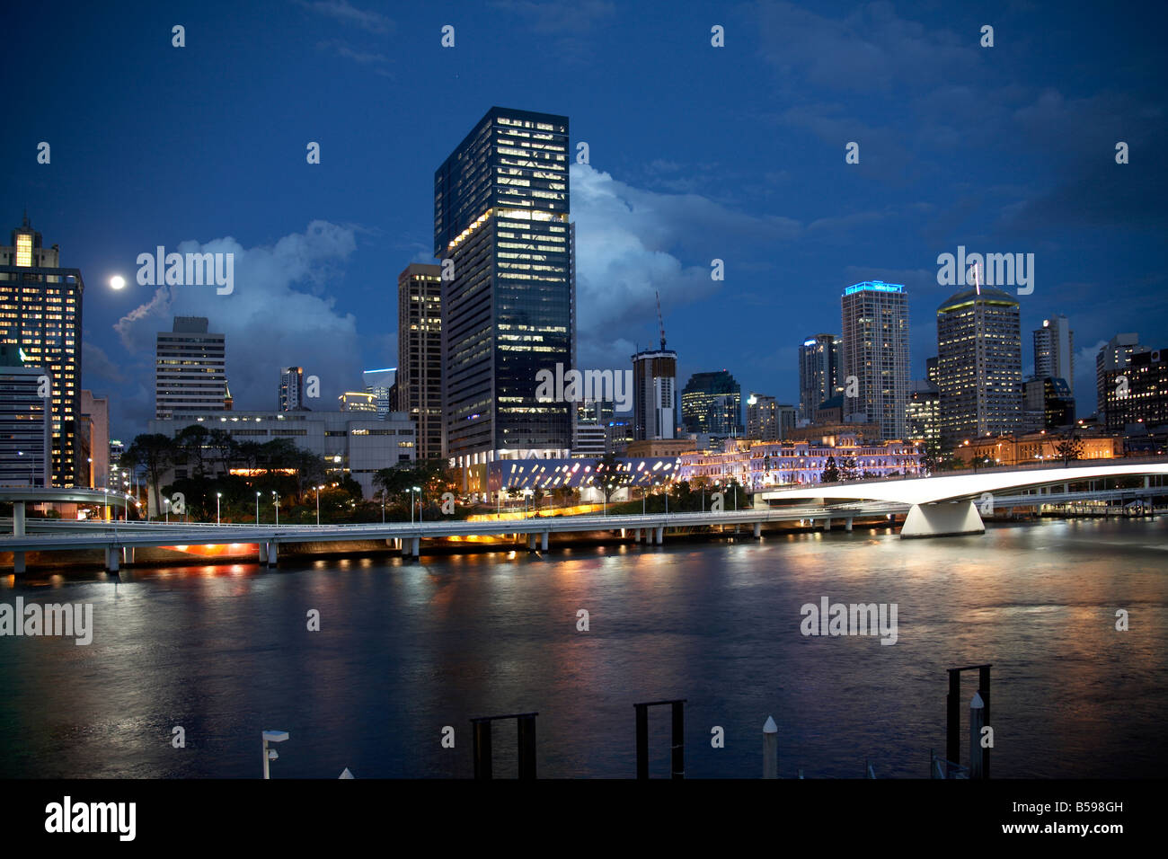 City centre business district waterfront buildings skyline beyond river ...