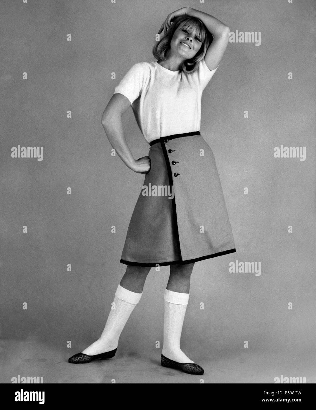 Reveille Fashions 1965: Marilyn Rickards modeling a white t-shirt and ...