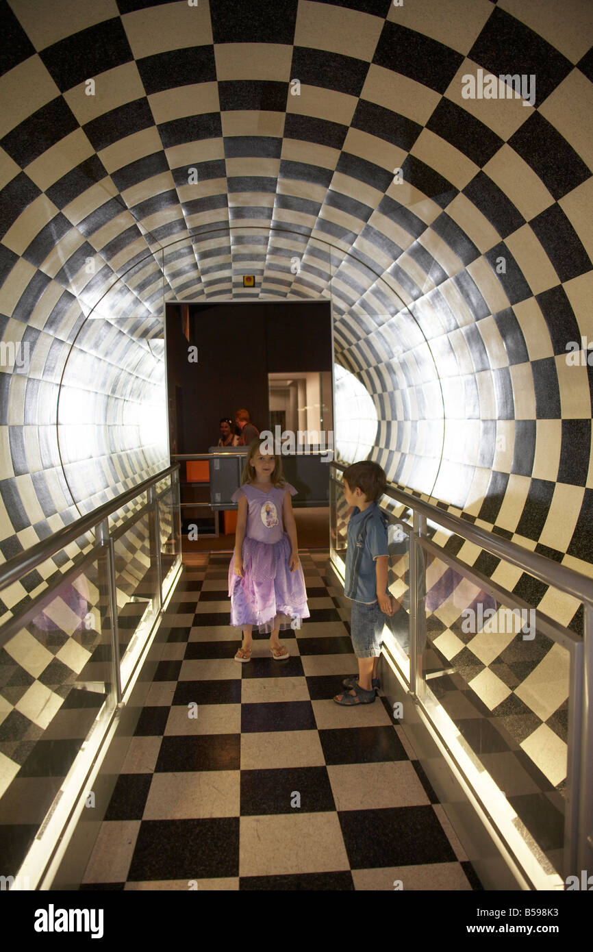 tube room black white checkerboard two young children in Brisbane ...