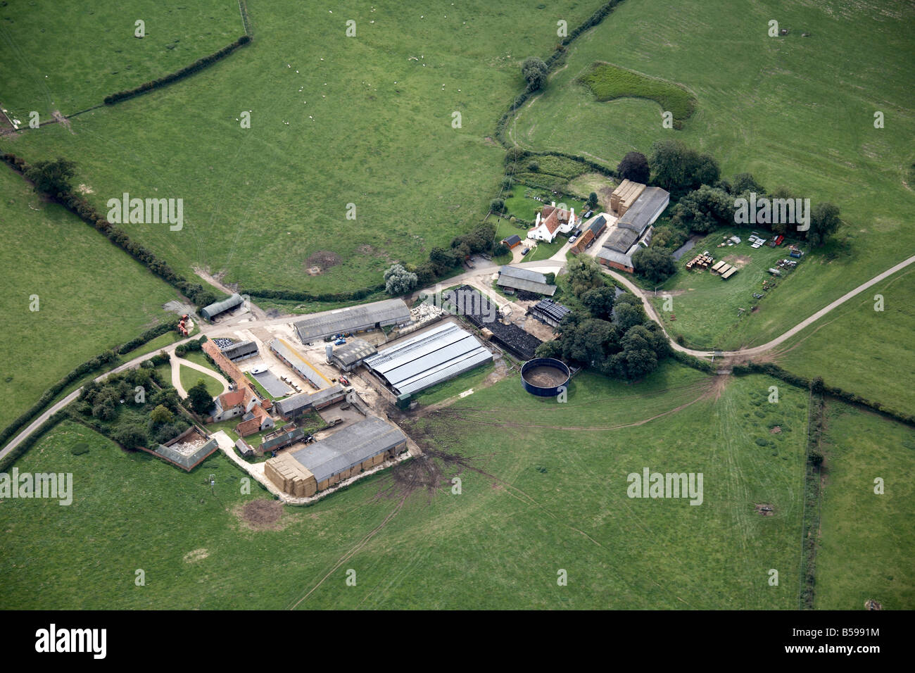 Aerial view south west of country farm fields Buckinghamshire England ...