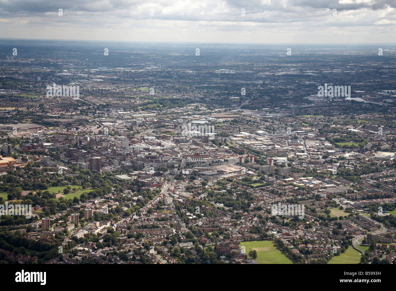 Aerial view south east of suburban houses playing fields trees tower ...
