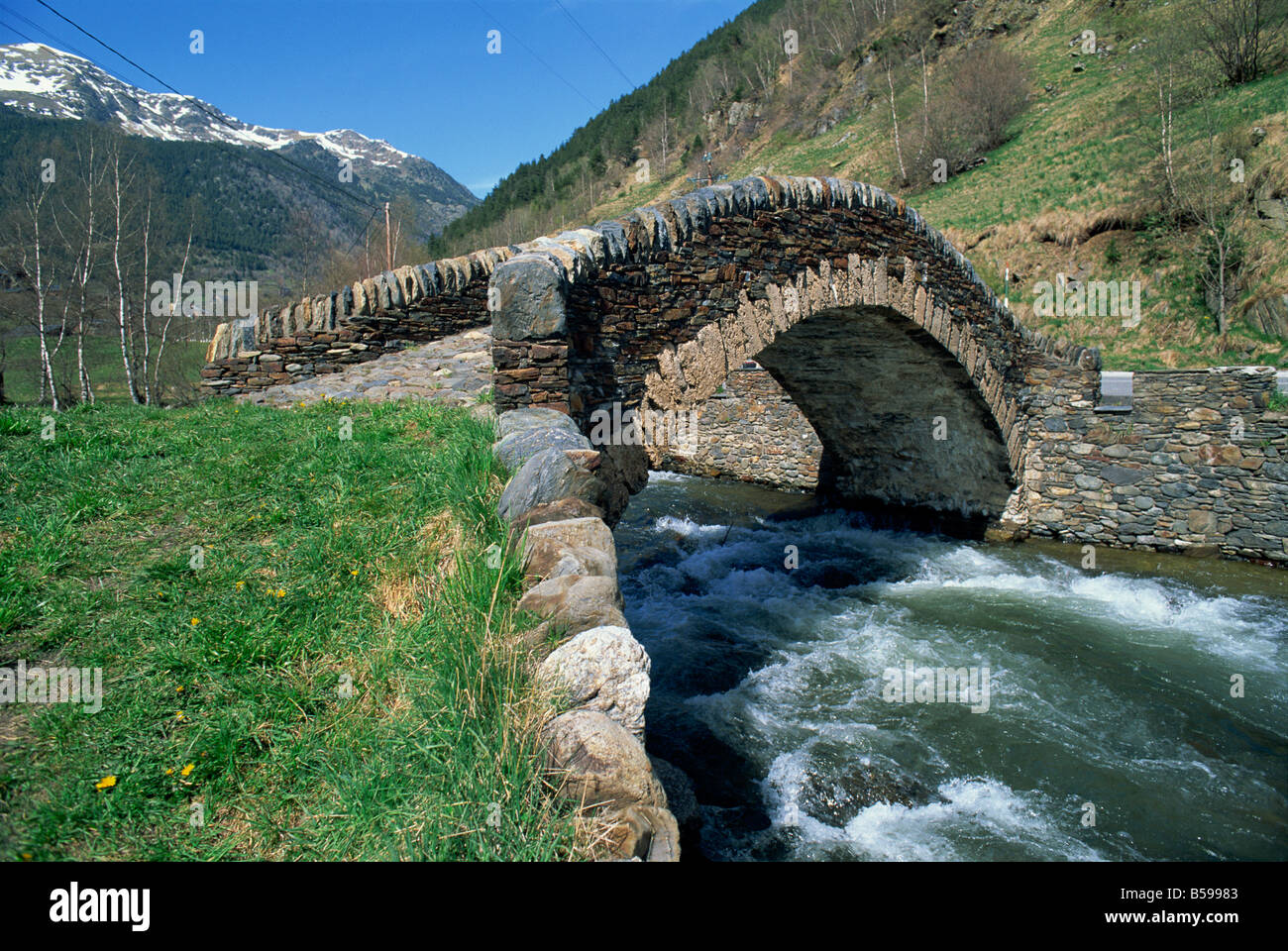 Ancient stone bridge over a river in the La Malana district in the ...
