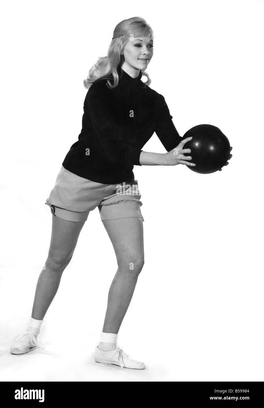 Reveille Fashions 1964: Jo Waring wearing a bowling suit of shorts and ...