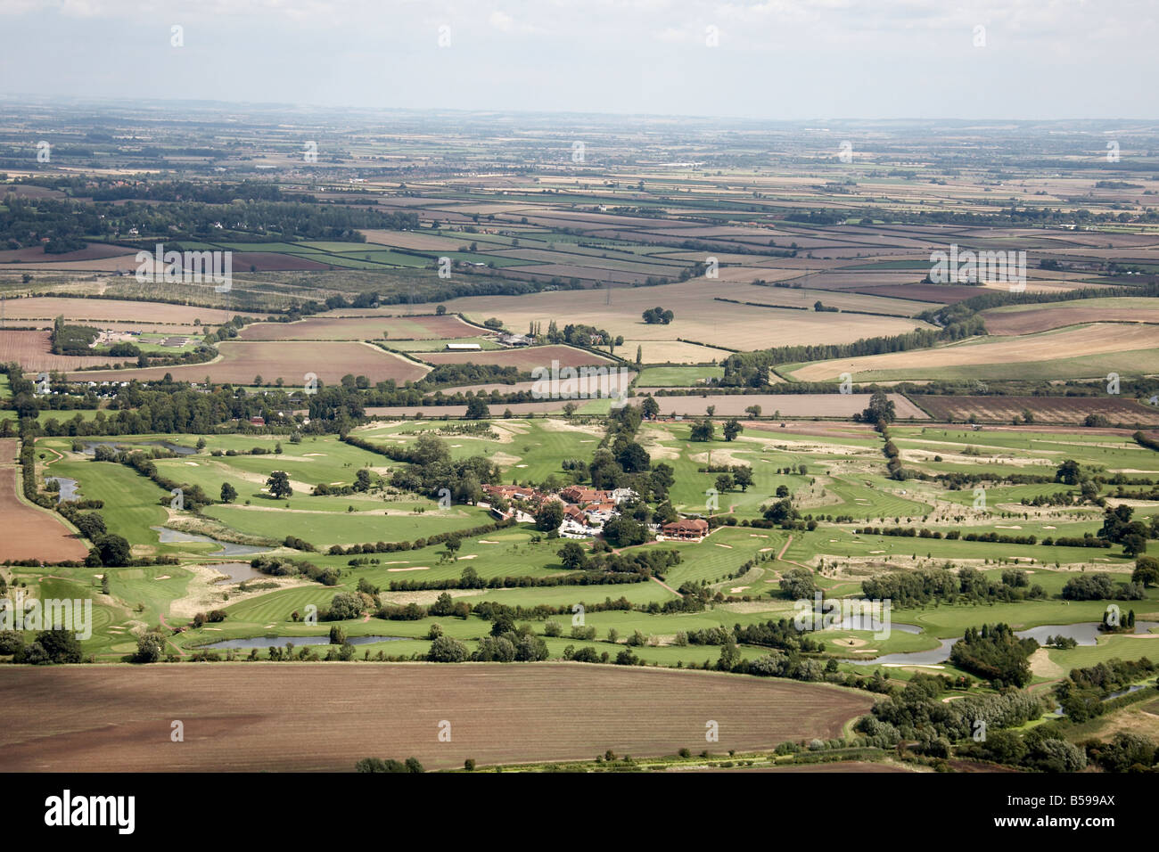 Aerial view north east of Bassingfield country fields trees golf course ...
