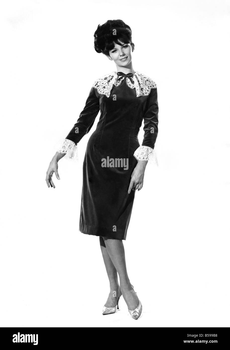 Reveille Fashions 1964: Meriel Weston modeling a velvet evening dress ...