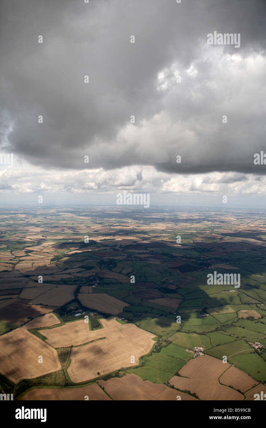 Abstract aerial view south east of country fields grey clouds and cloud ...