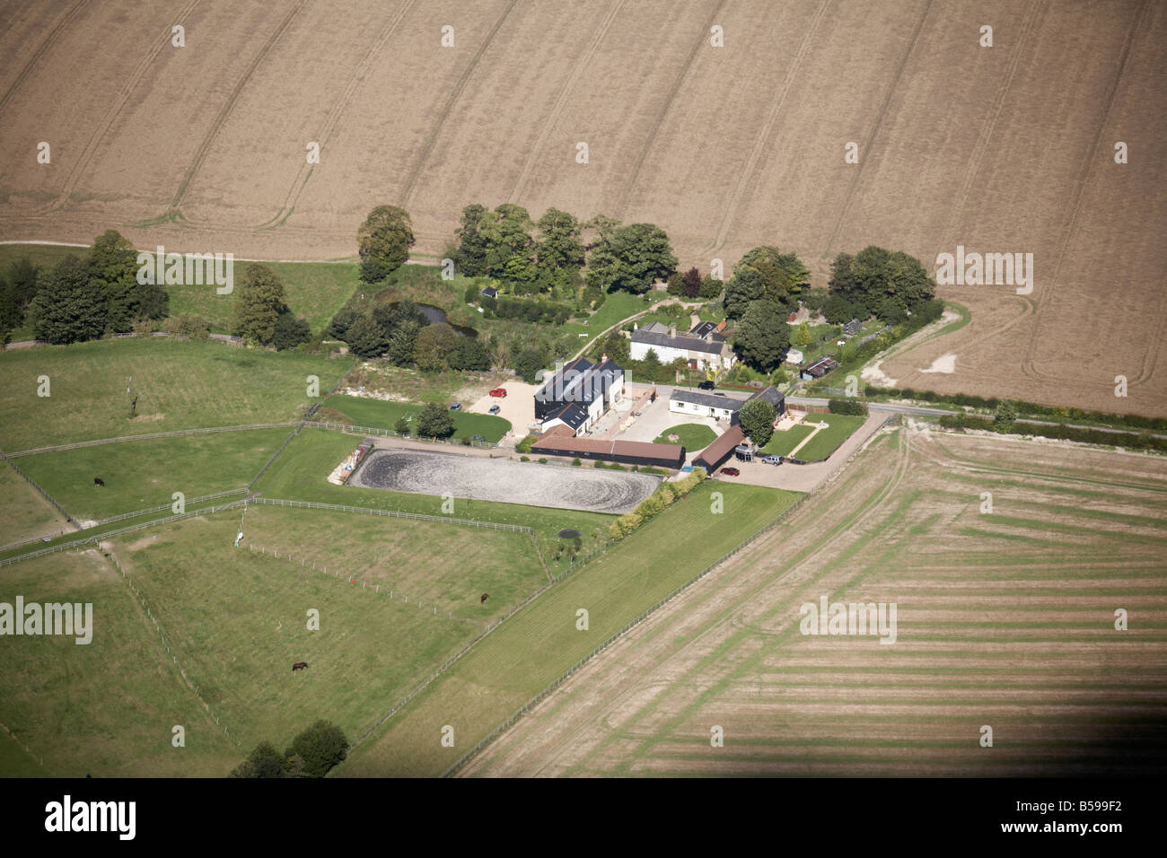 Aerial view north east of country farm horse riding school country ...