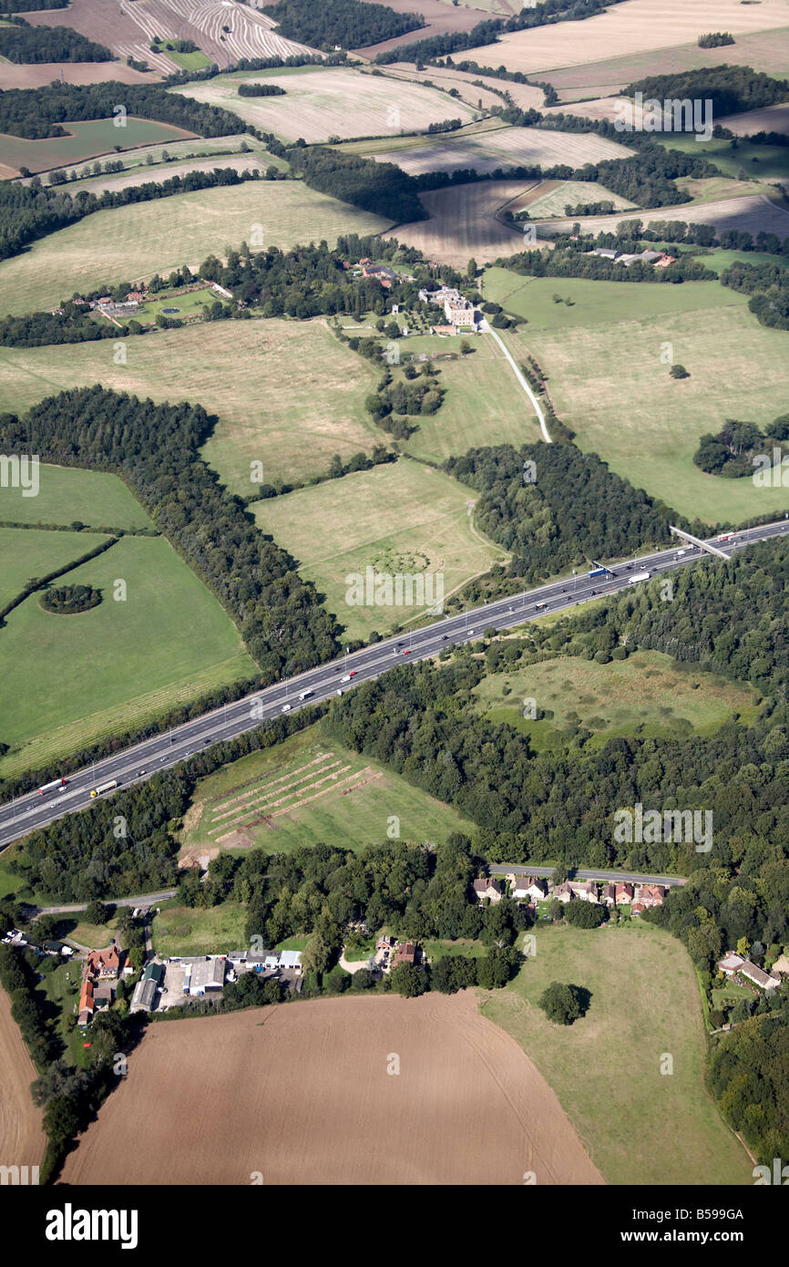 Aerial view north east of M25 Motorway country fields trees country ...