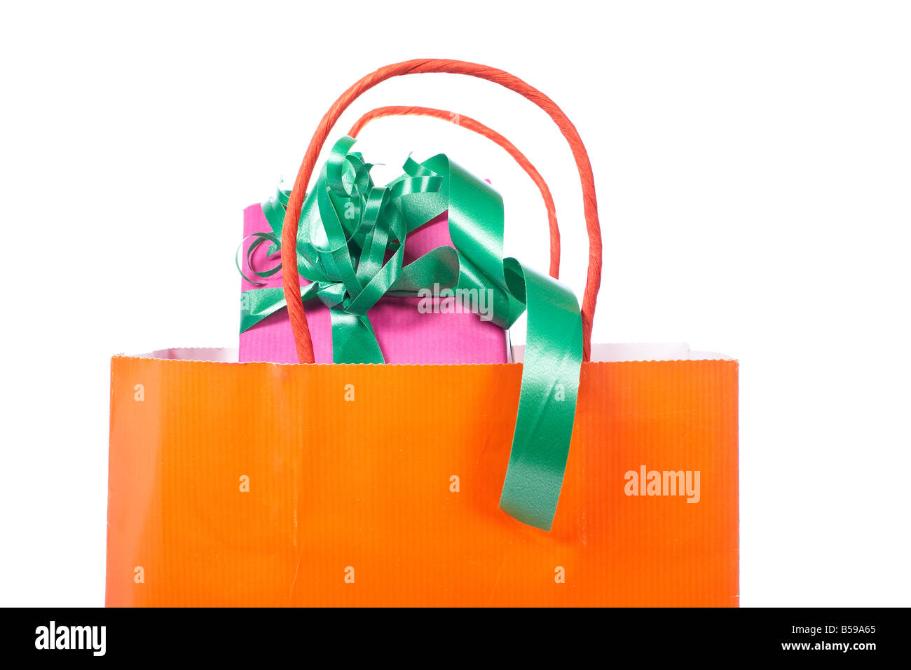 Shopping bag with gifts inside isolated on white background Stock Photo ...