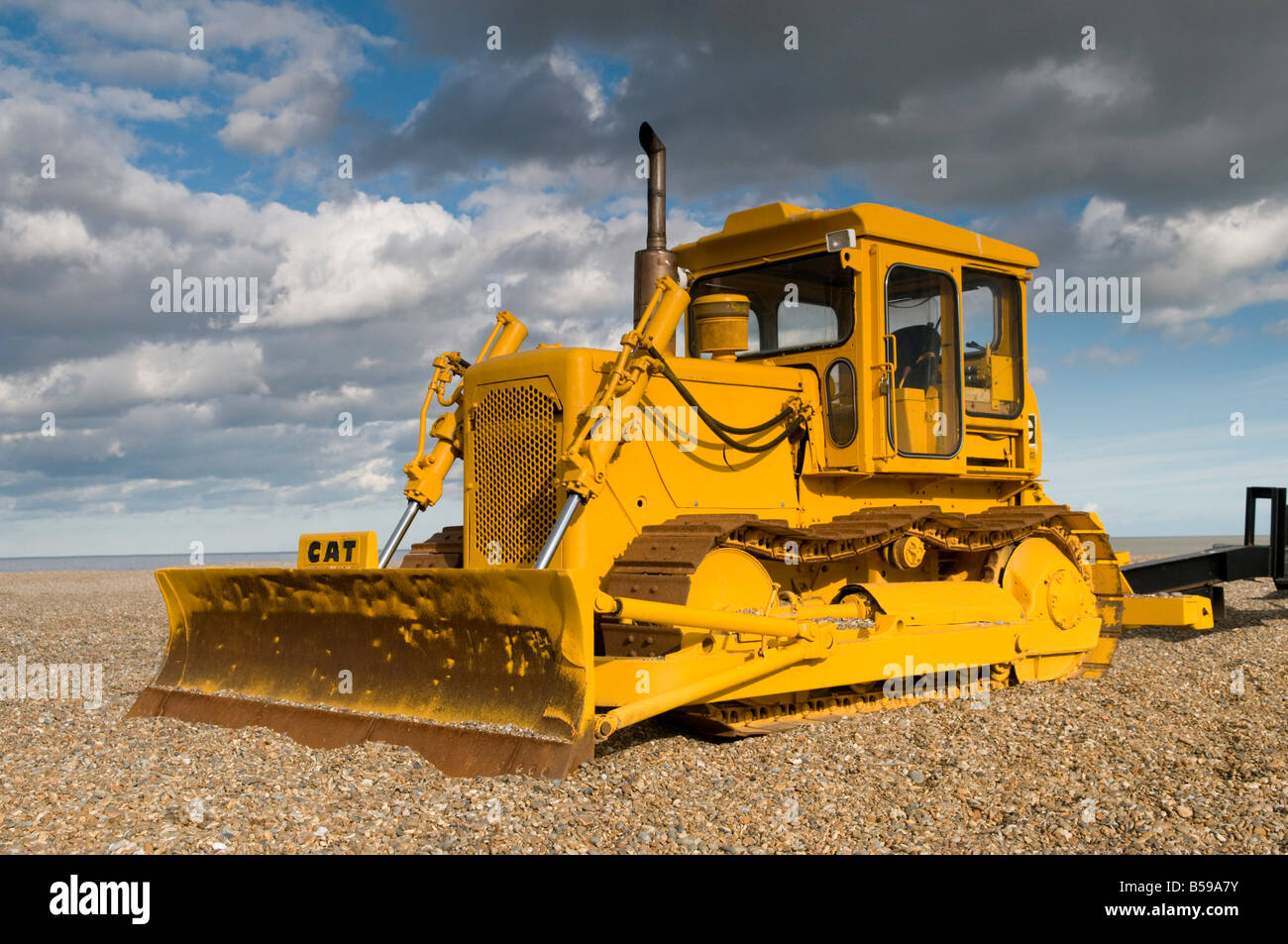 Bulldozer Parked On Aldeburgh Beach, Suffolk UK Stock Photo - Alamy