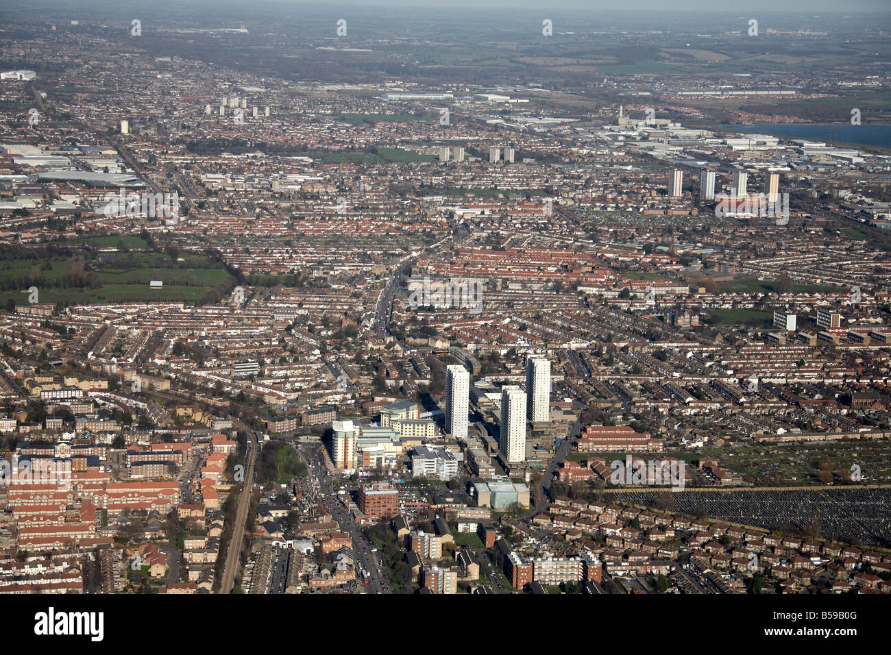 Aerial view north east of Lower Edmonton suburban houses tower blocks ...