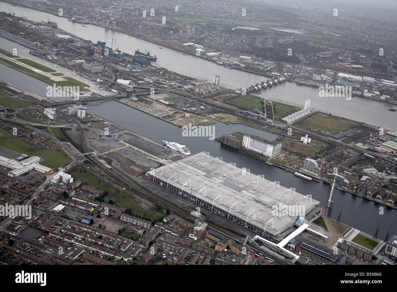 Aerial view south east of Royal Victoria Dock DLR Line Connaught Bridge ...