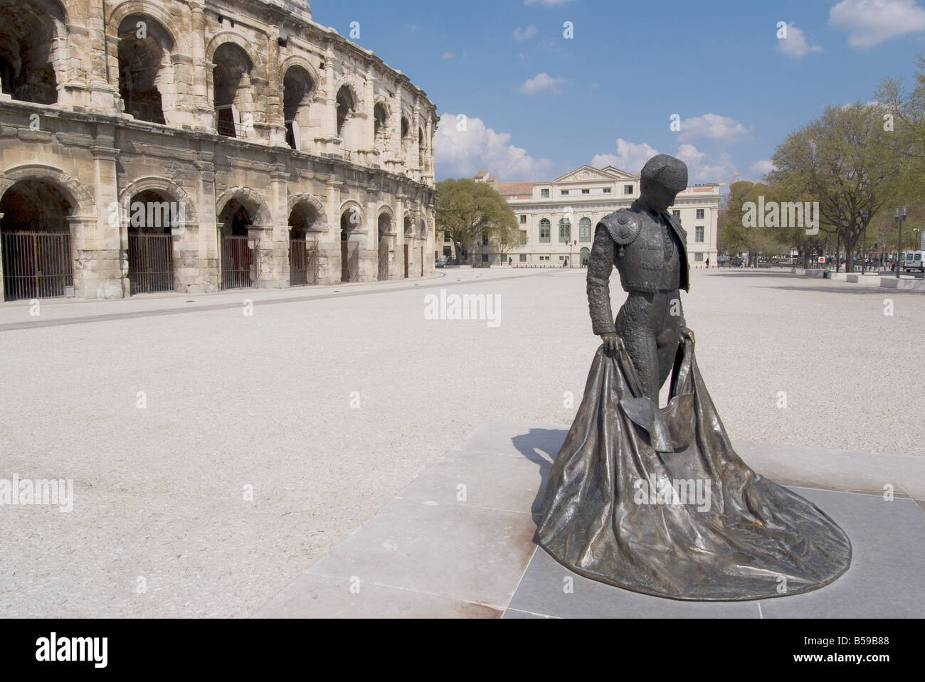 Roman arena with bullfighter statue, Nimes, Languedoc, France, Europe ...
