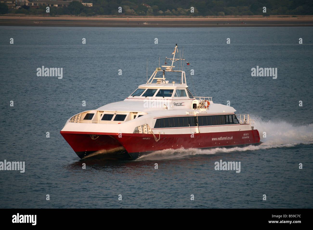 Red Funnel passenger ferry catamaran sailing on on Southampton Water in ...