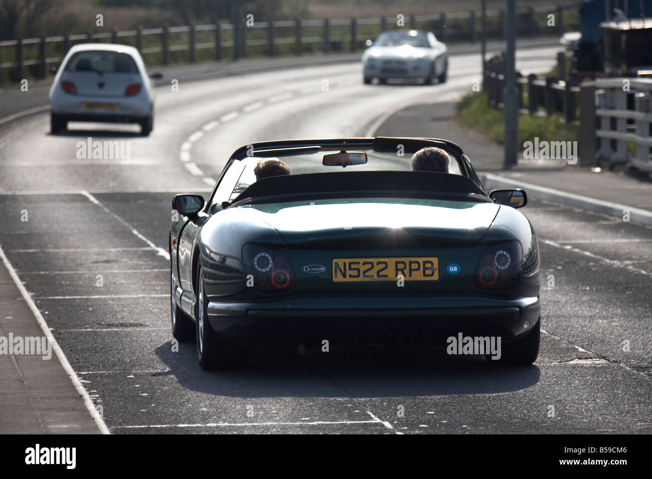 People driving open top TVR Chimaera roadster convertible sports car in ...