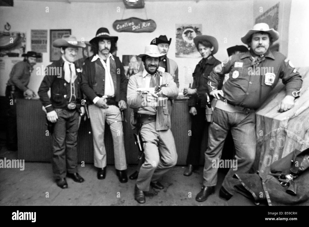 Members of the Fastest gun club in Holt, Wiltshire, fire their guns.Men ...