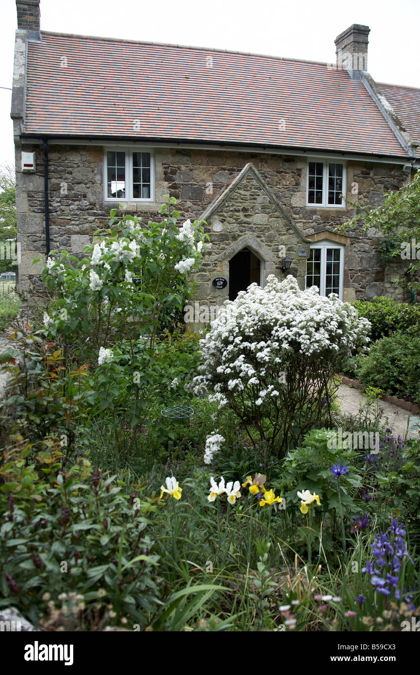 Old Garth Cottage house building with pretty garden near Mottistone ...