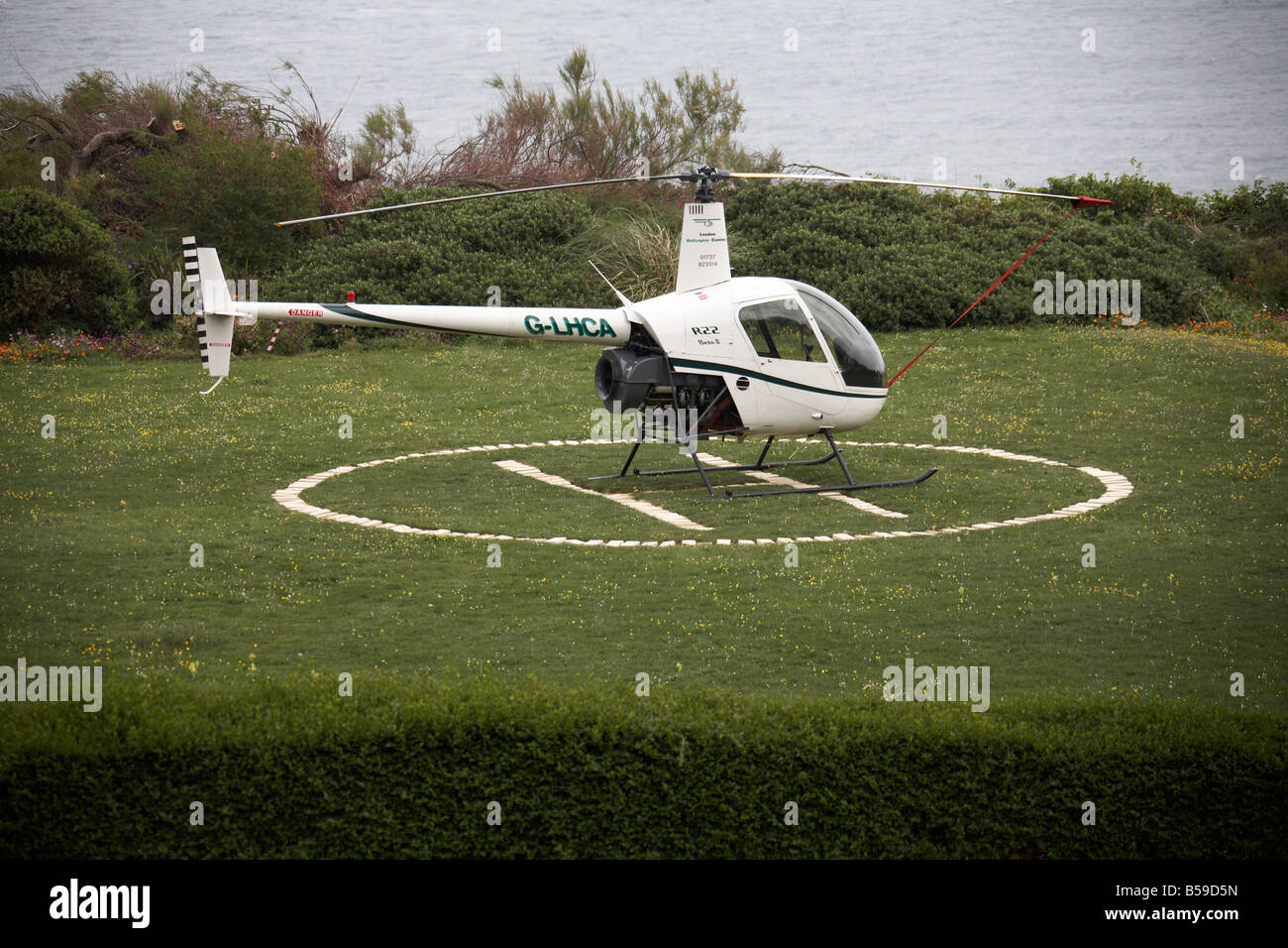 Robinson R22 helicopter parked near Ventnor Isle of Wight England UK Stock Photo - Alamy