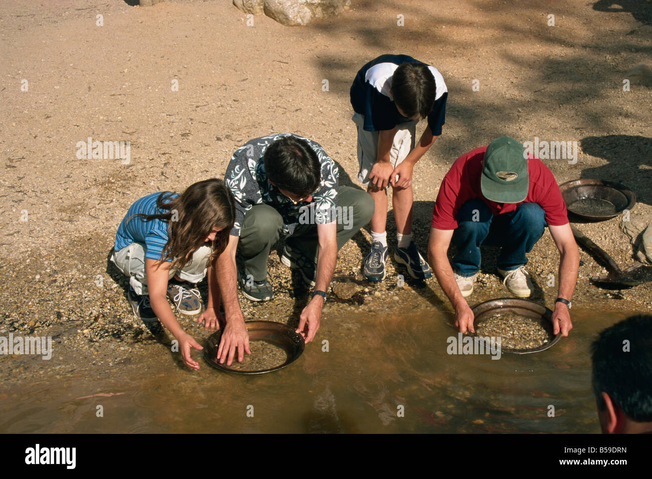 Children panning for gold hi-res stock photography and images - Alamy