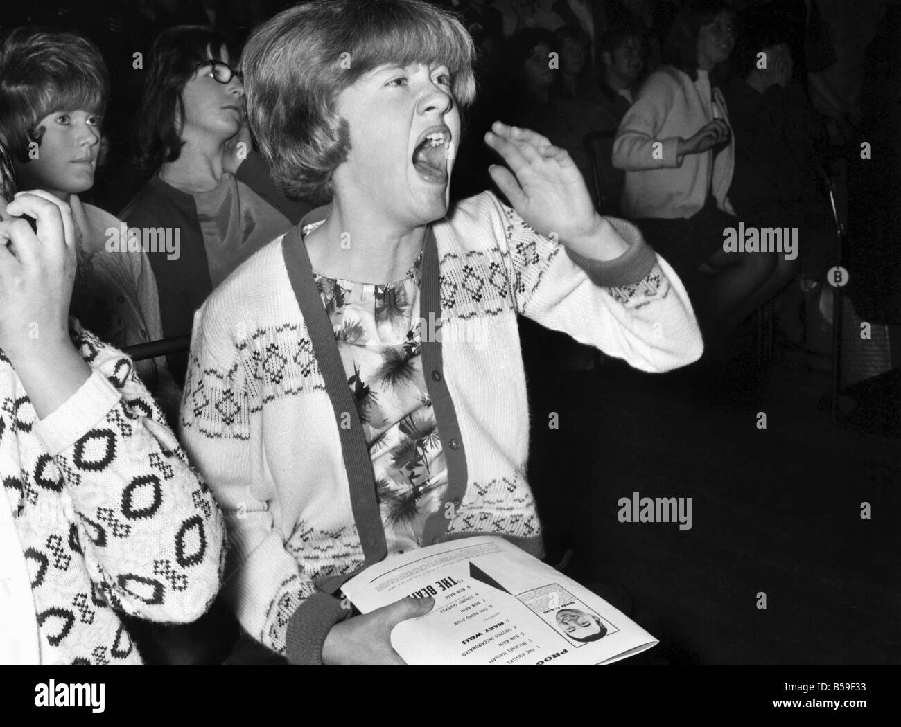 Screaming girl fans greet the Beatles last night on their appearance in ...