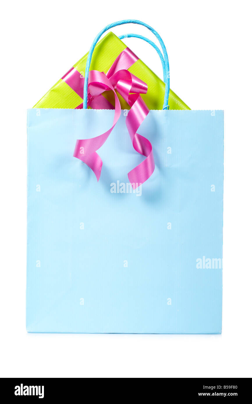 Shopping bag with gifts inside isolated on white background Stock Photo ...