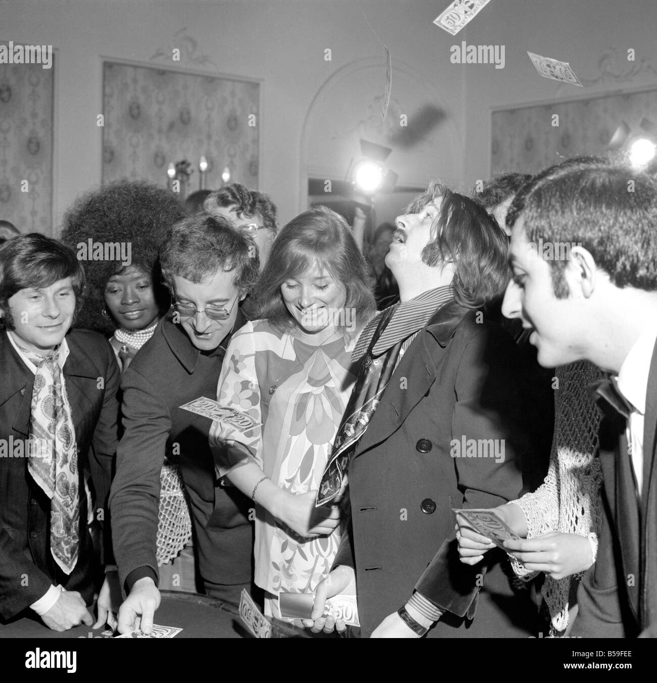 Peter Sellers and Ringo Starr have a go at roulette at the Thank you ...