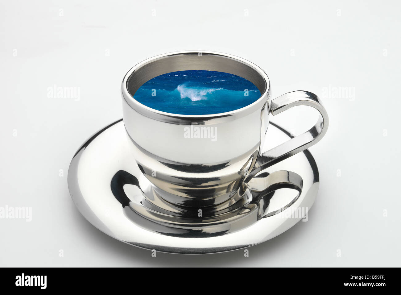 Waves Sea coffee cup Stainless Stock Photo - Alamy