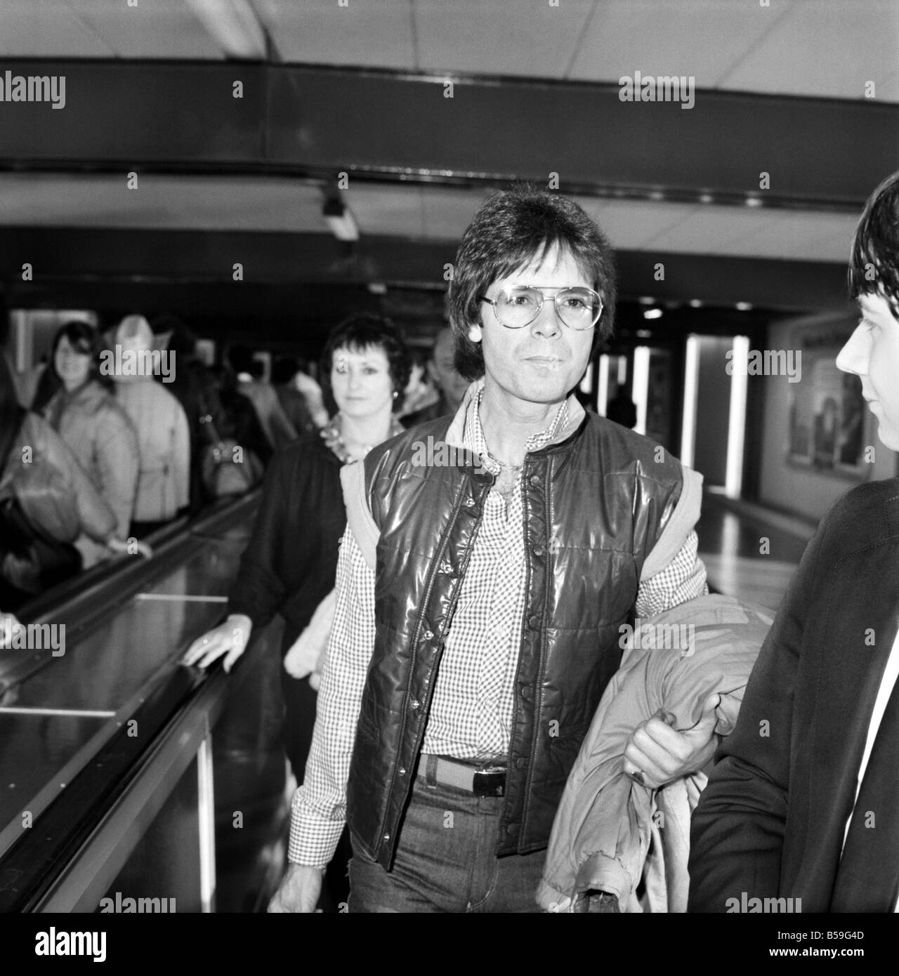 Entertainment. Music: Departure of pop singer Cliff Richard flying to ...