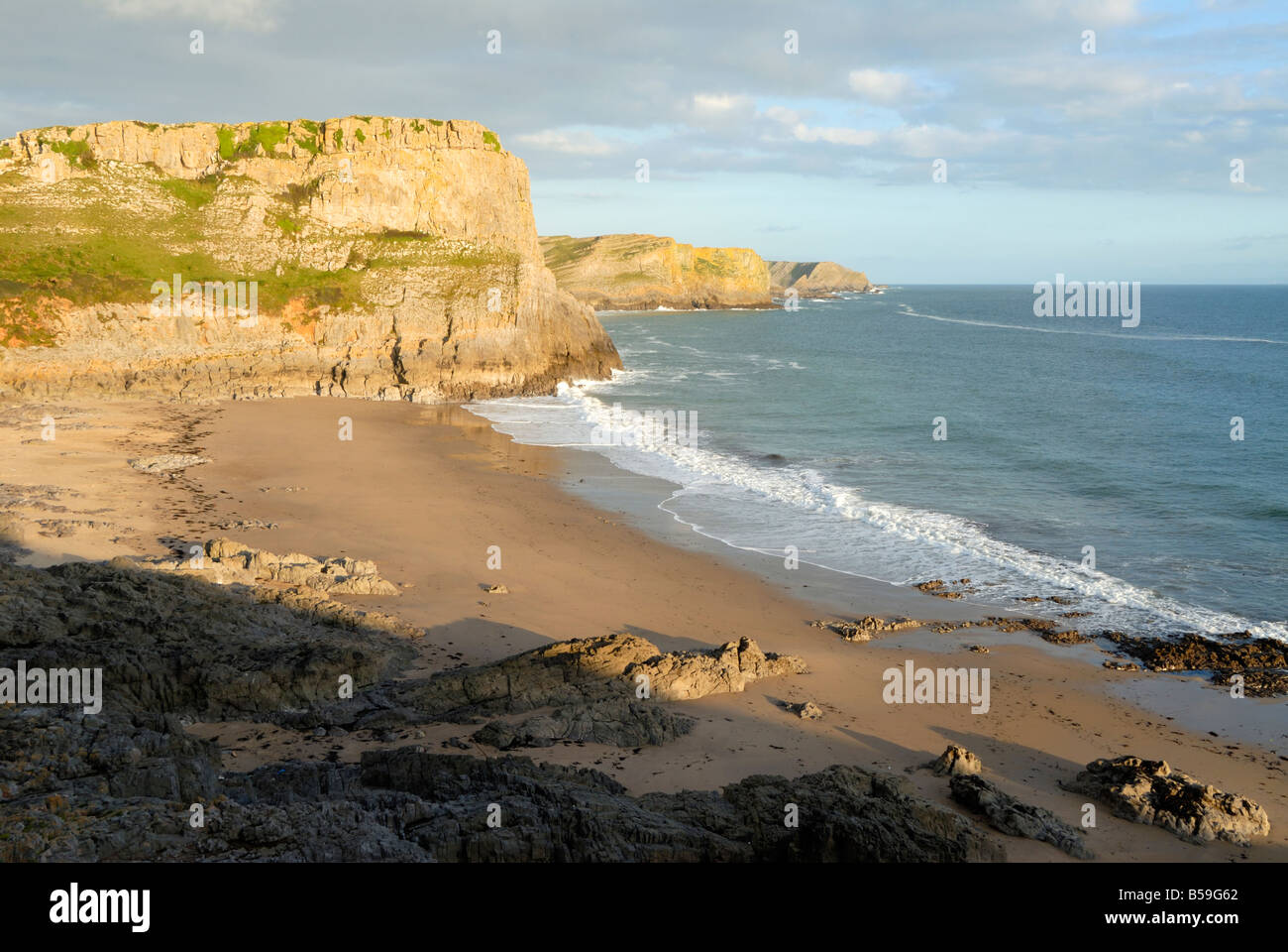 Sunset at Fall Bay on the Gower Peninsula Stock Photo - Alamy