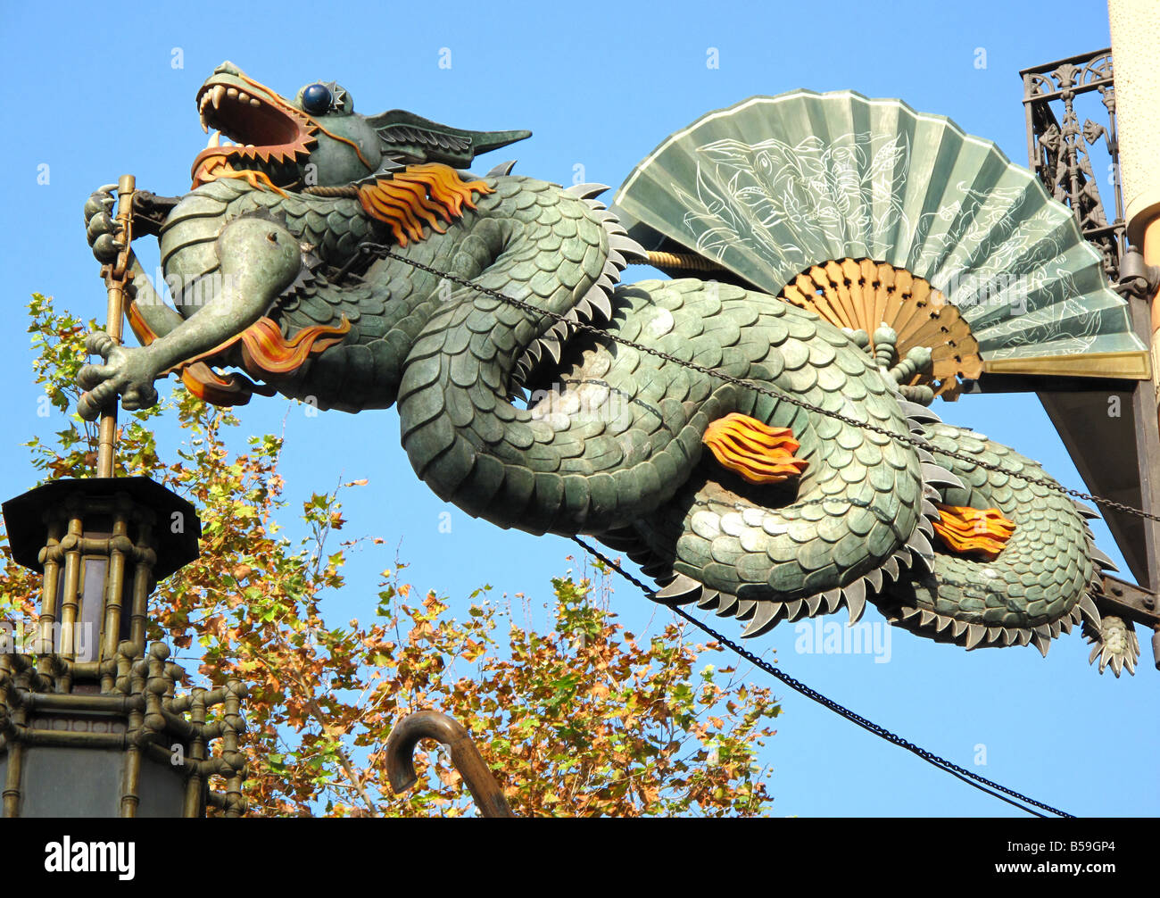 Art deco dragon designed as shop sign for former umbrella shop at Placa ...