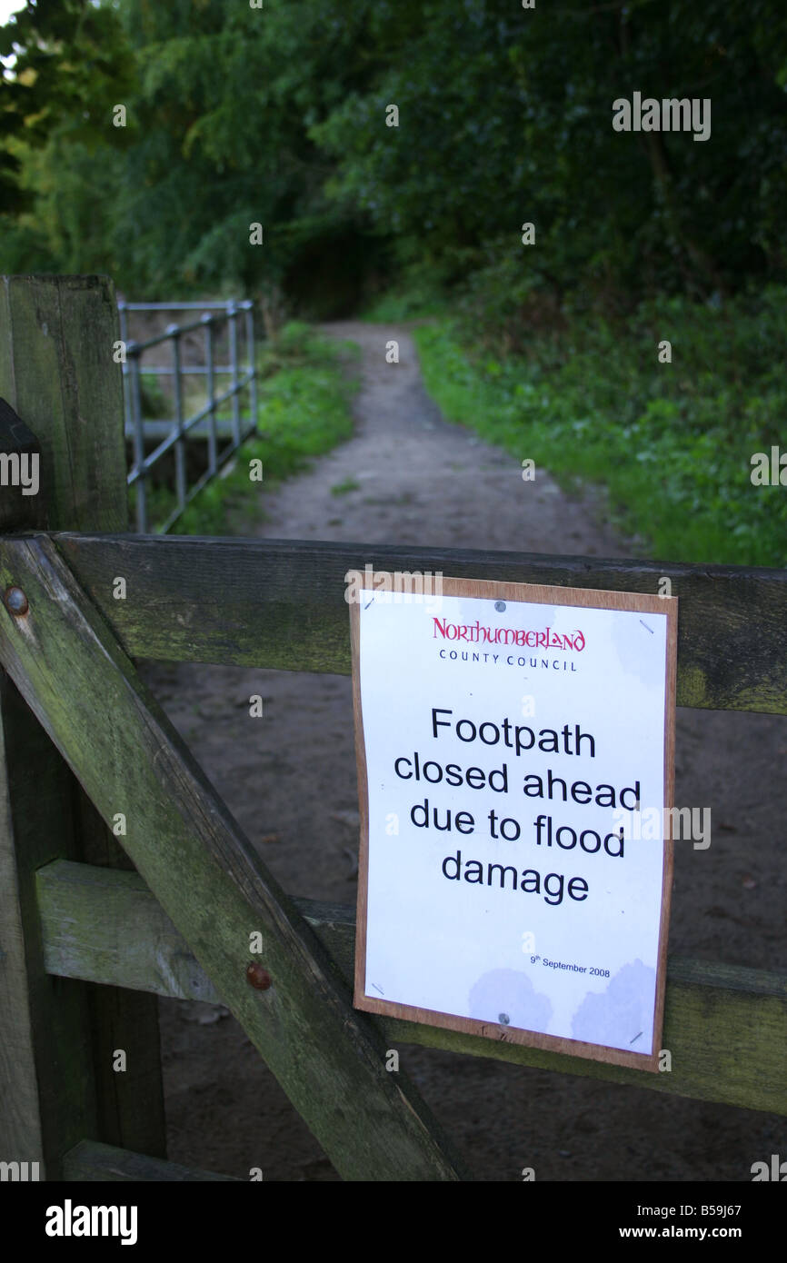Footpath closed ahead due to flood damage sign at Warkworth ...