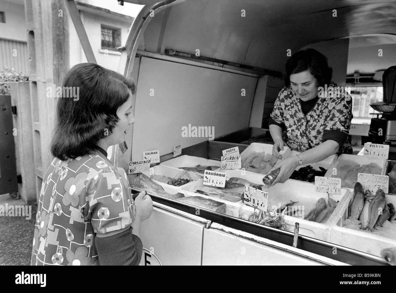 French housewife Mrs. Maria Quaranta buying food stuff from the ...