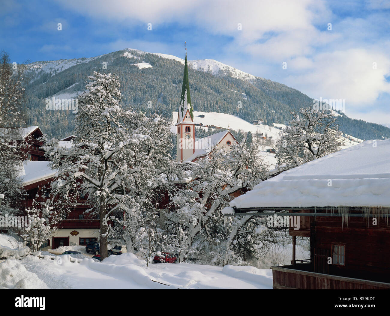 Snow covers the village and church of Alpbach in the Tyrol in the ...