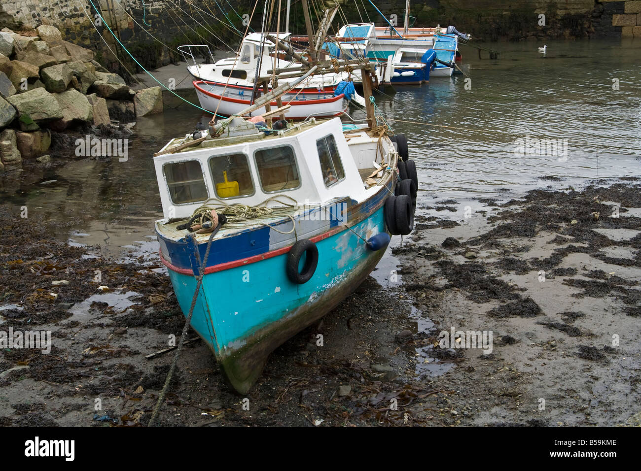 Fishing boat at low tide hi-res stock photography and images - Alamy