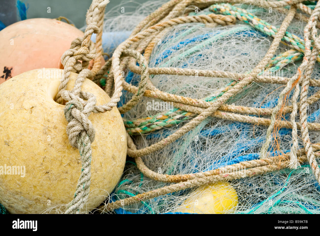 Fishing nets and floats Stock Photo - Alamy